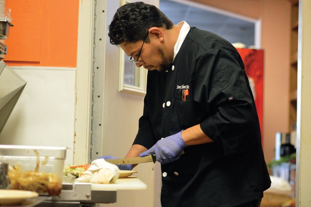 Carlos Salgado, longtime chef behind Tam's BackStage, is now striking ...